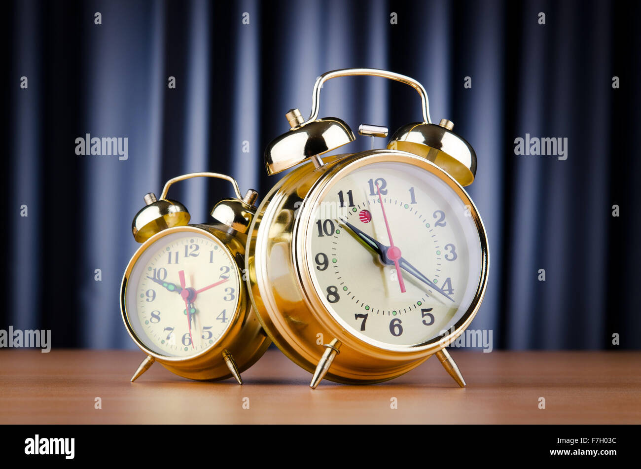 Time concept with alarm clock Stock Photo - Alamy
