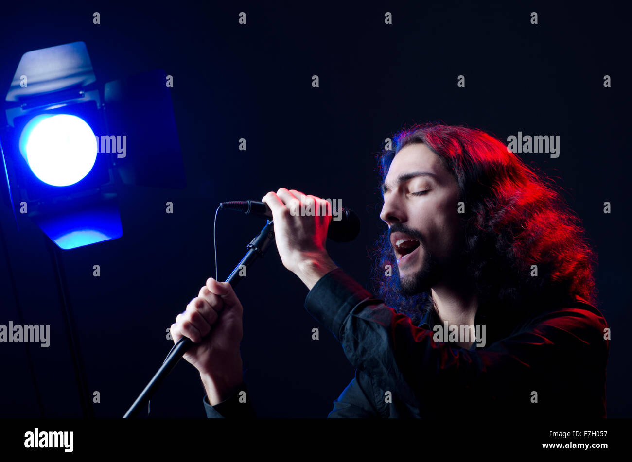 Man singing at the concert Stock Photo - Alamy