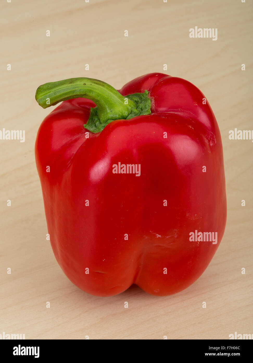 Ripe Fresh Red pepper on the wood background Stock Photo - Alamy