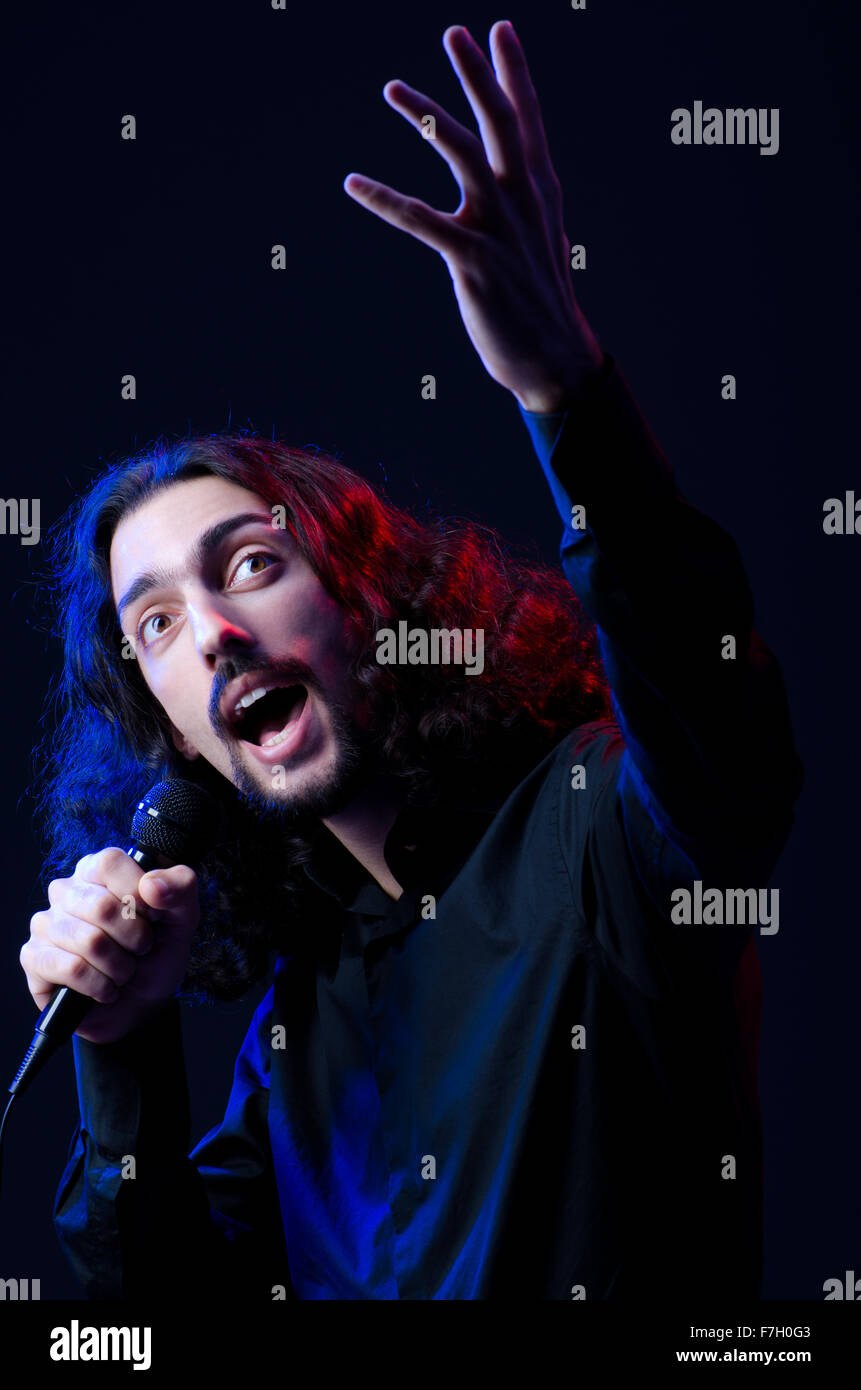 Man singing at the concert Stock Photo - Alamy