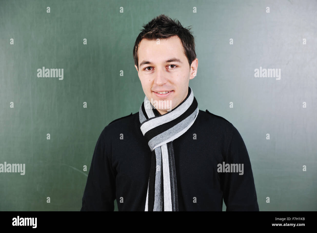 happy young student boy posing at university school classroom Stock ...