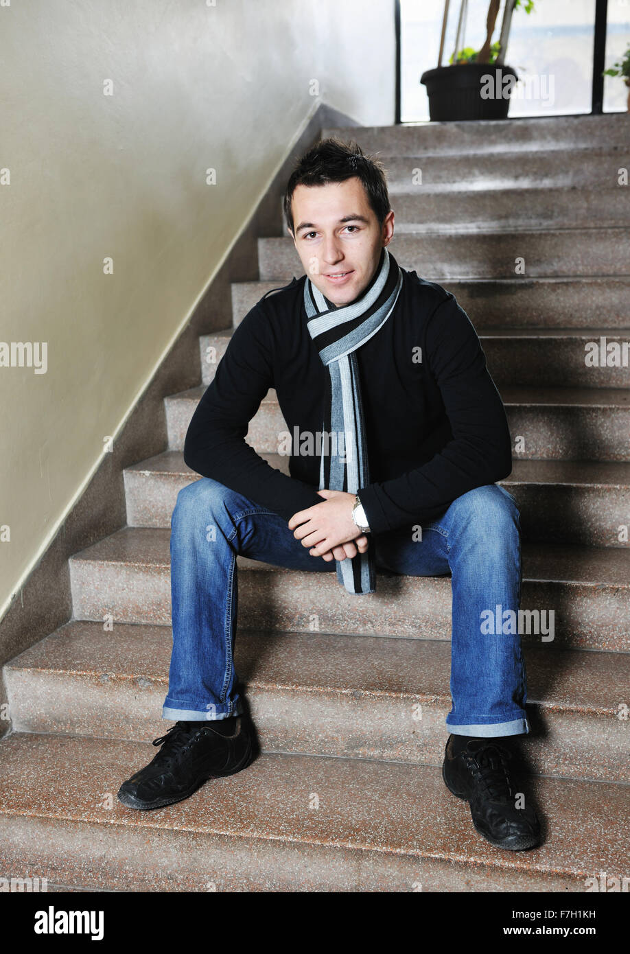 happy young student boy posing at university school classroom Stock ...