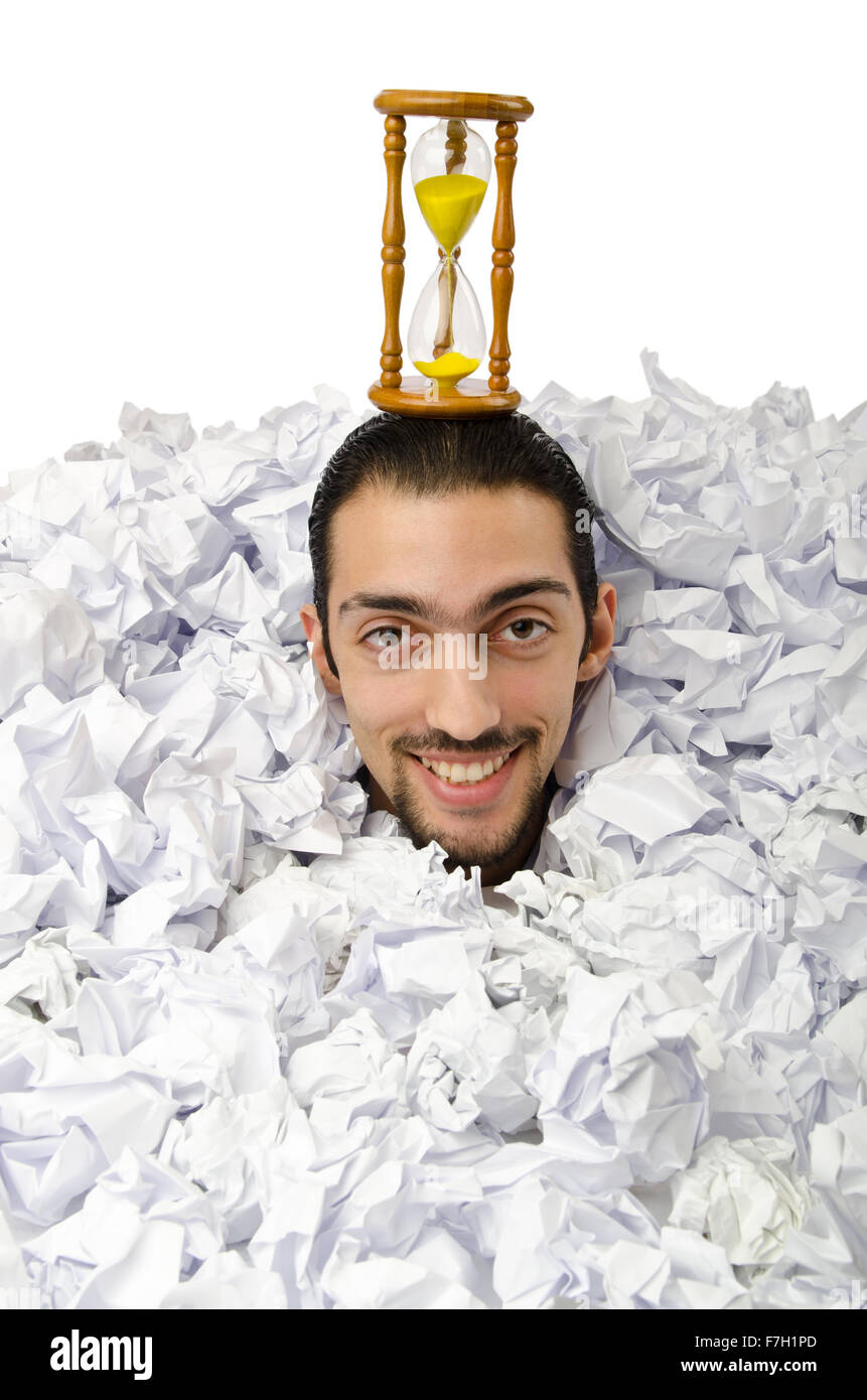 Man with lots of crumpled paper Stock Photo - Alamy