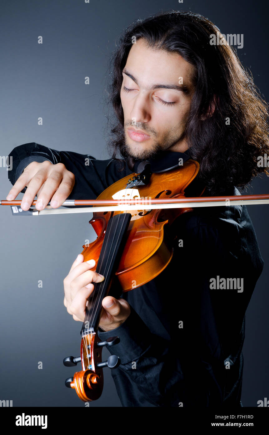 Violin player playing the intstrument Stock Photo - Alamy