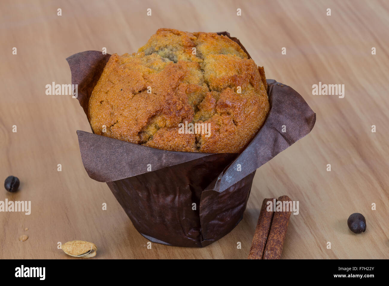 Fresh backed Muffin on the wood background Stock Photo - Alamy