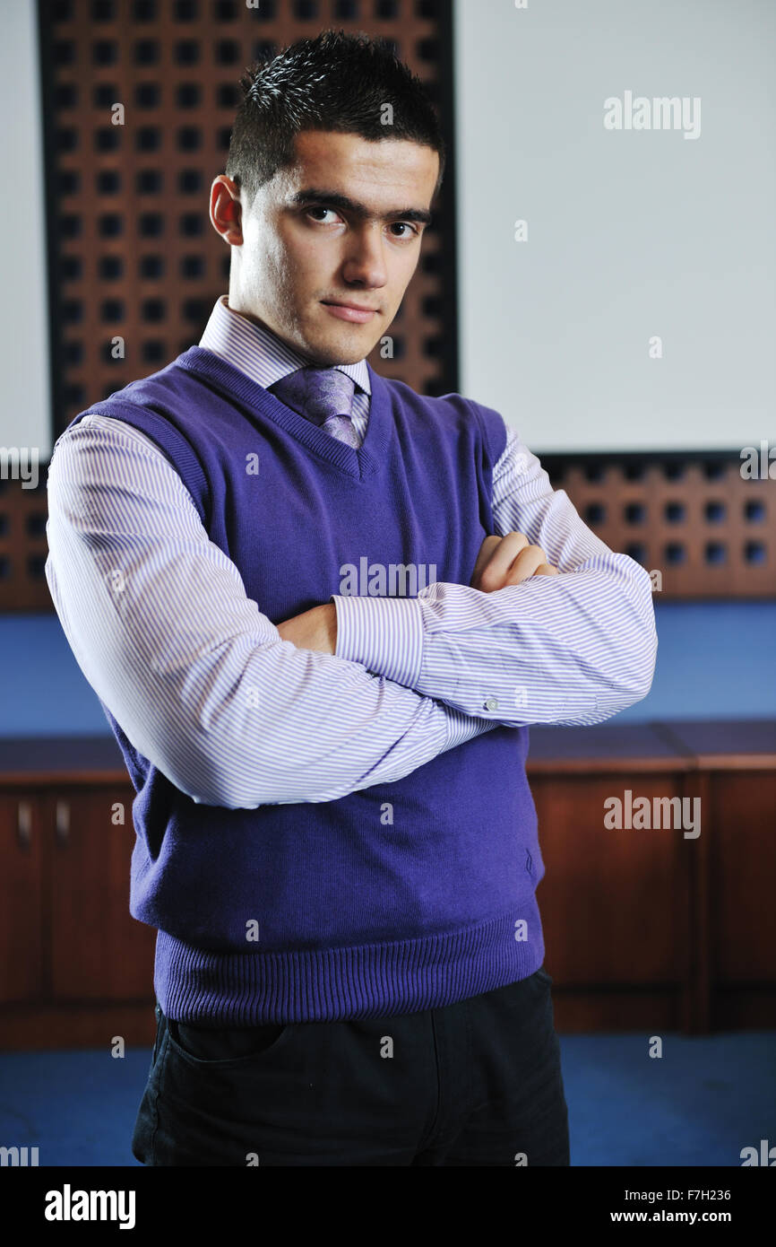 happy young student boy posing at university school classroom Stock ...