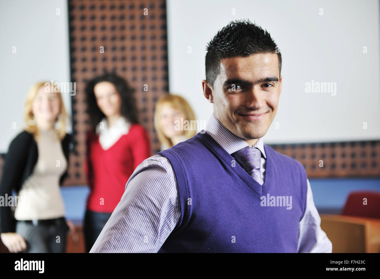 happy young student boy posing at university school classroom Stock ...