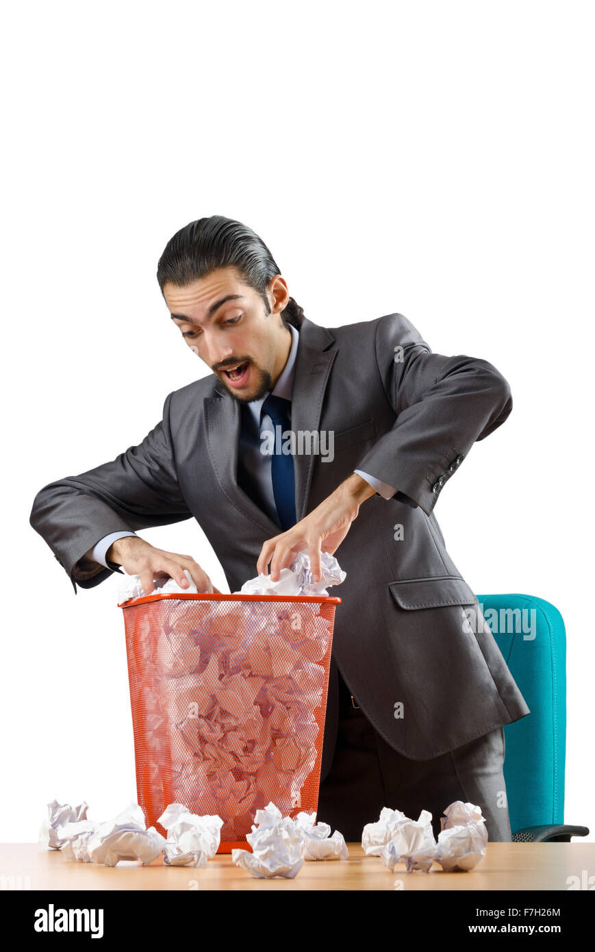 Man with lots of wasted paper Stock Photo - Alamy