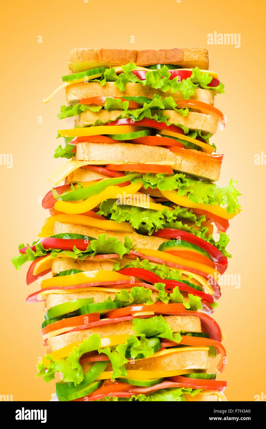 Giant sandwich against gradient background Stock Photo - Alamy