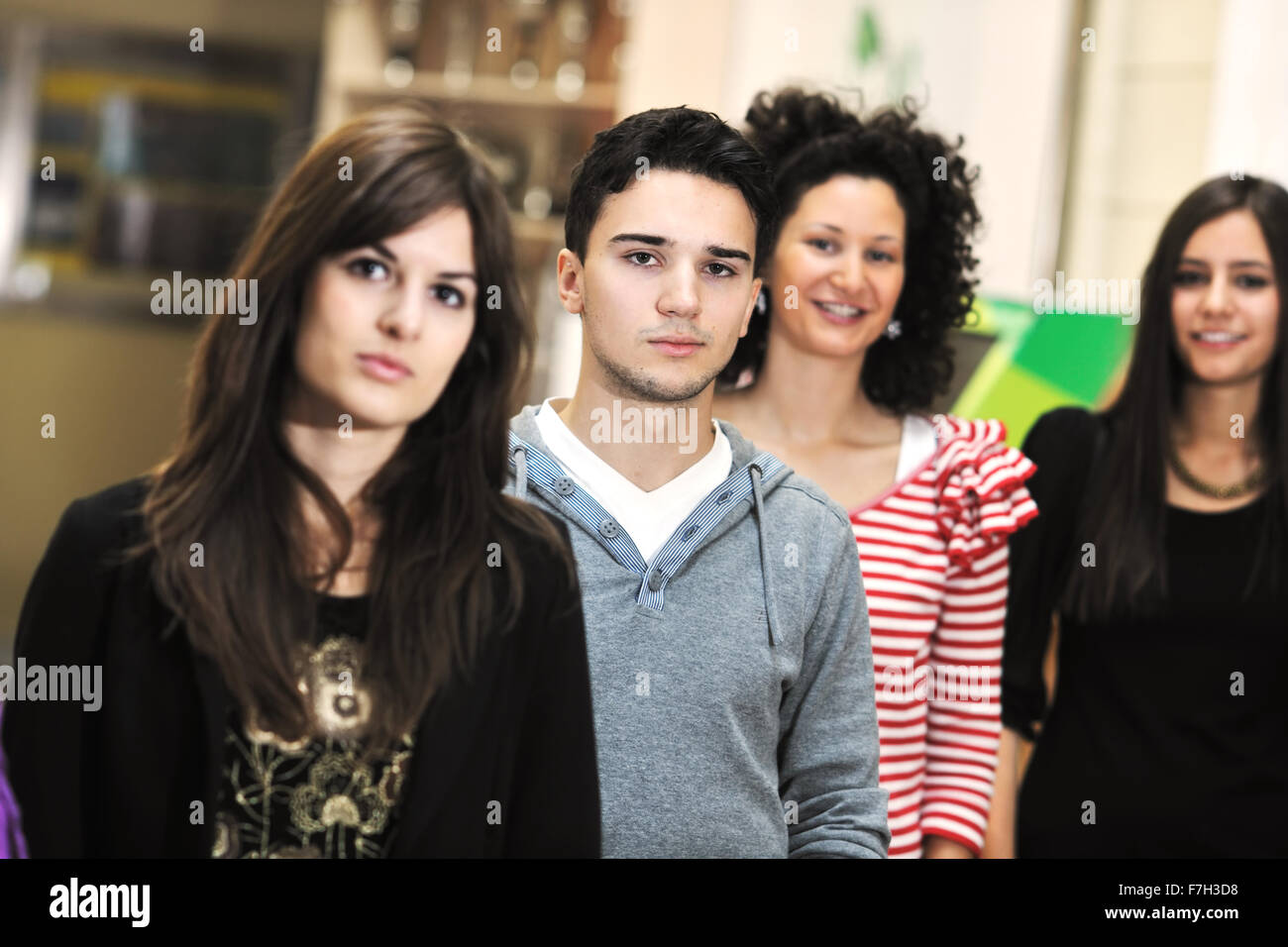 happy students people group portrait at university indoor building ...