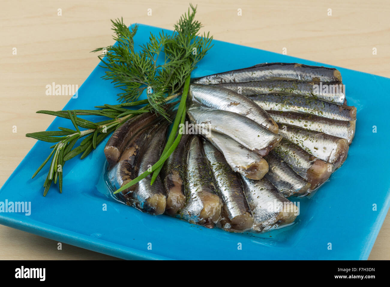 Salted anchovy with spices and herbs - ready for eat Stock Photo - Alamy