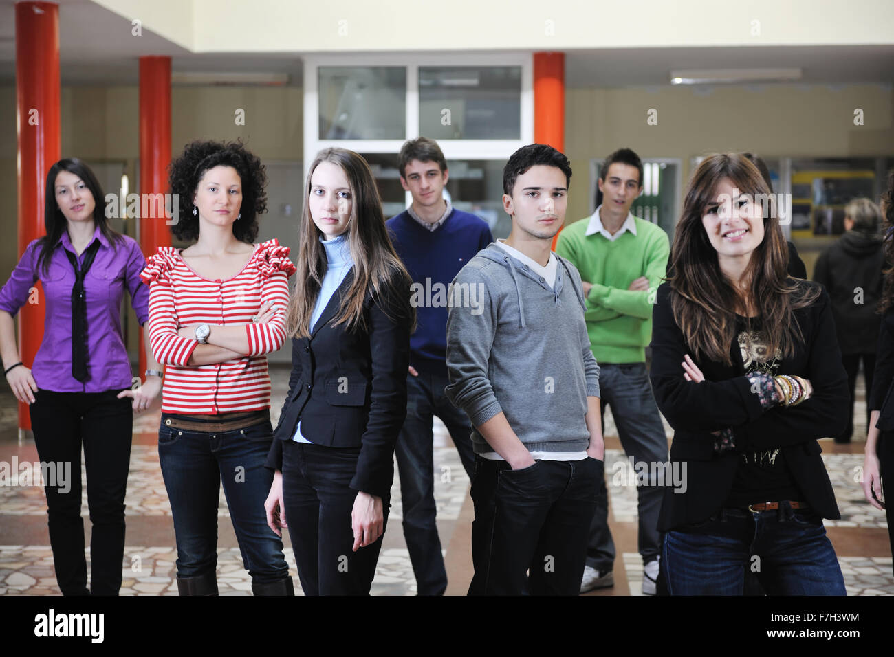happy students people group portrait at university indoor building ...