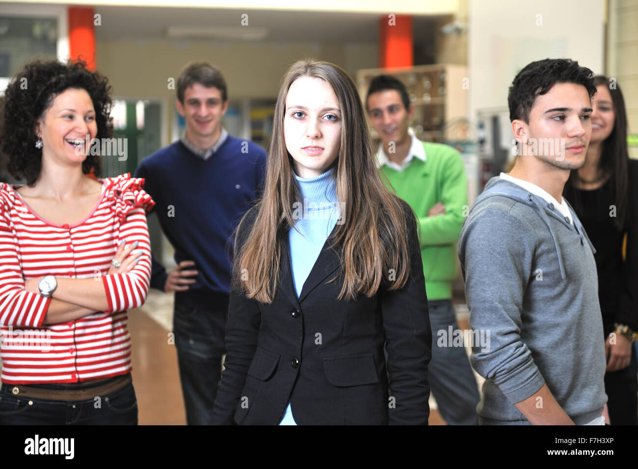 happy students people group portrait at university indoor building ...