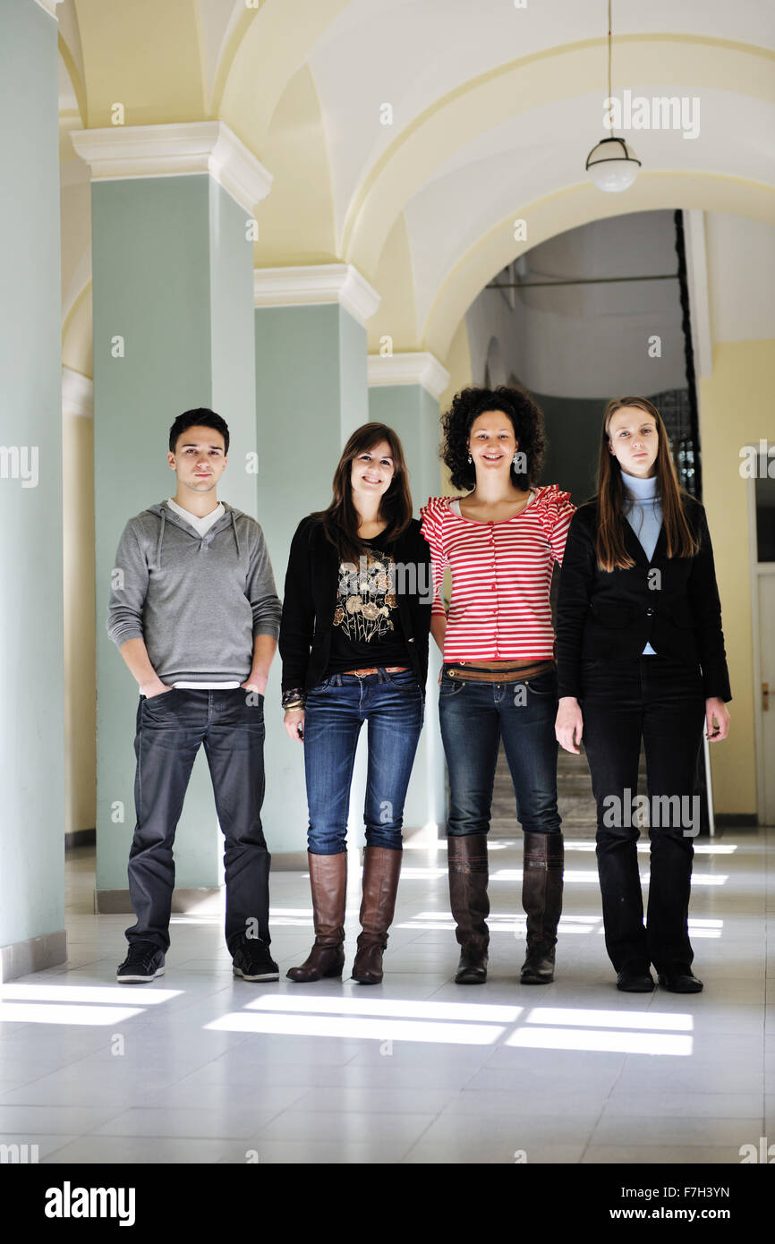 happy students people group portrait at university indoor building ...