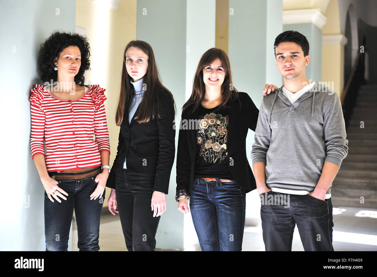 happy students people group portrait at university indoor building ...