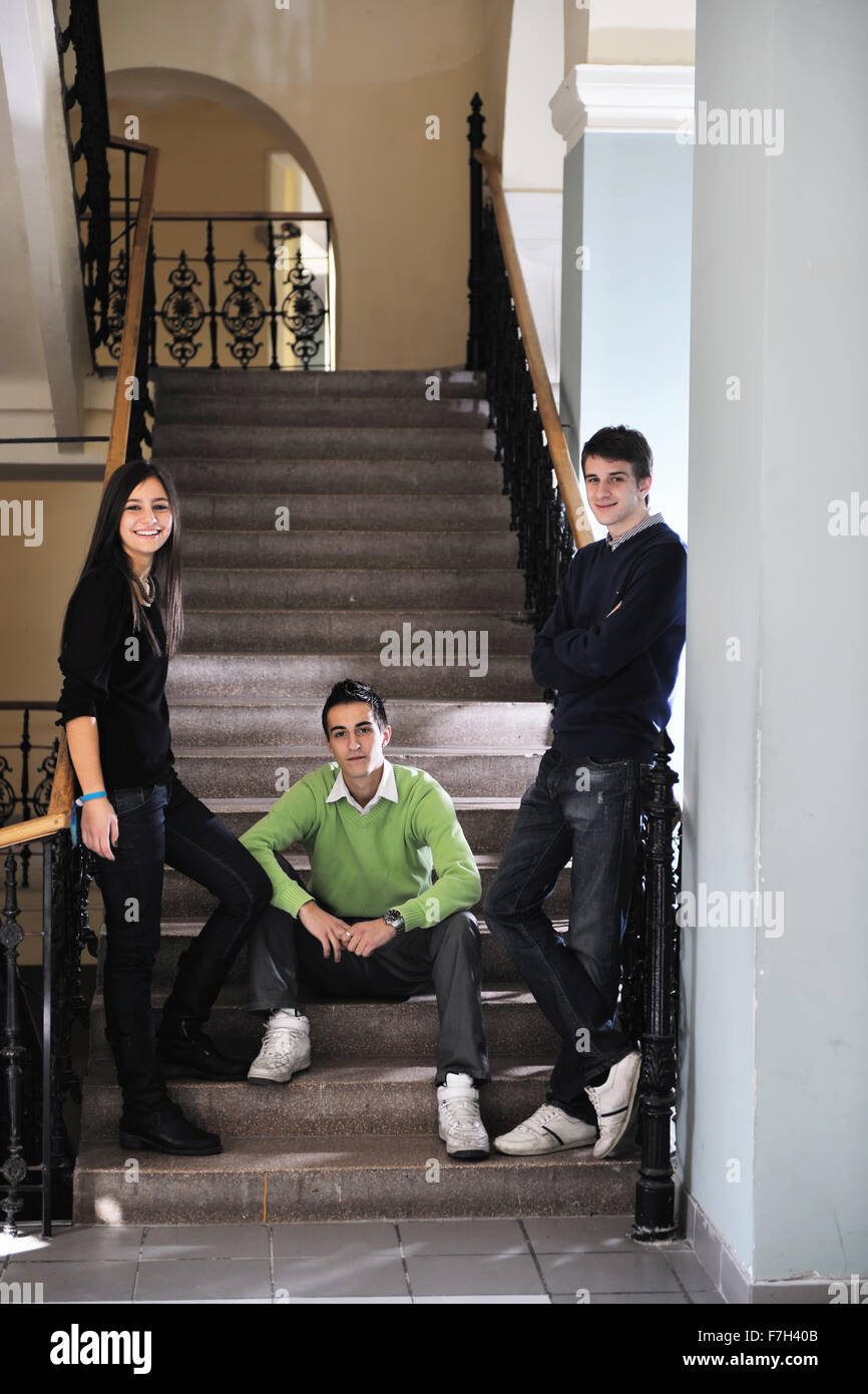 happy students people group portrait at university indoor building ...