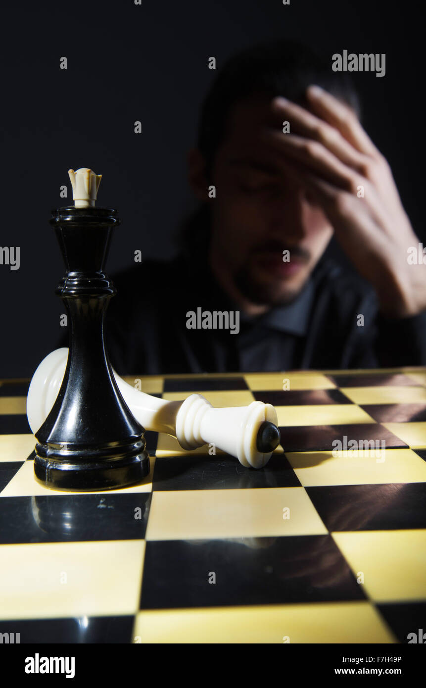 Chess player playing his game Stock Photo - Alamy