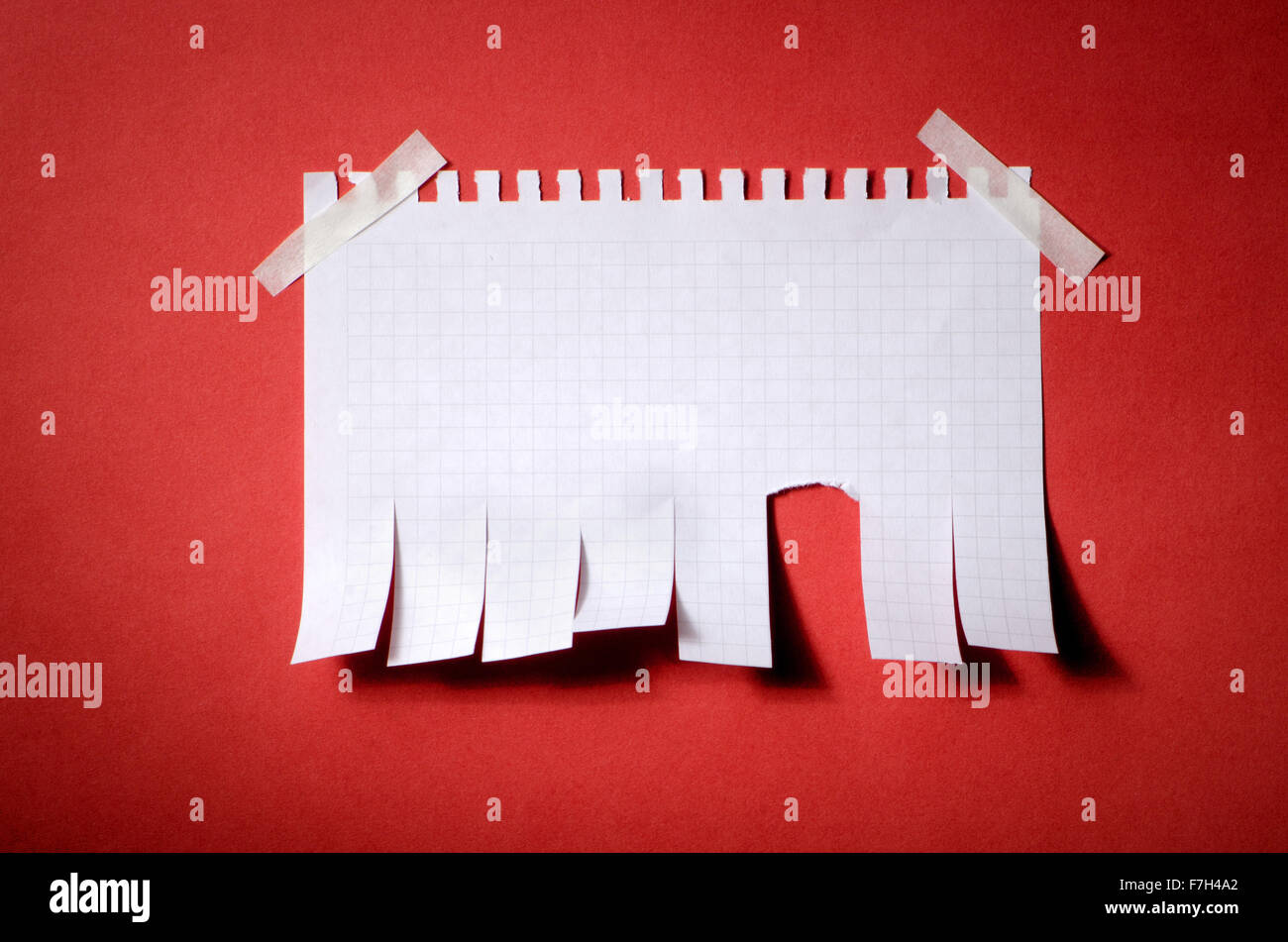 Tear off paper notice on the wall Stock Photo - Alamy