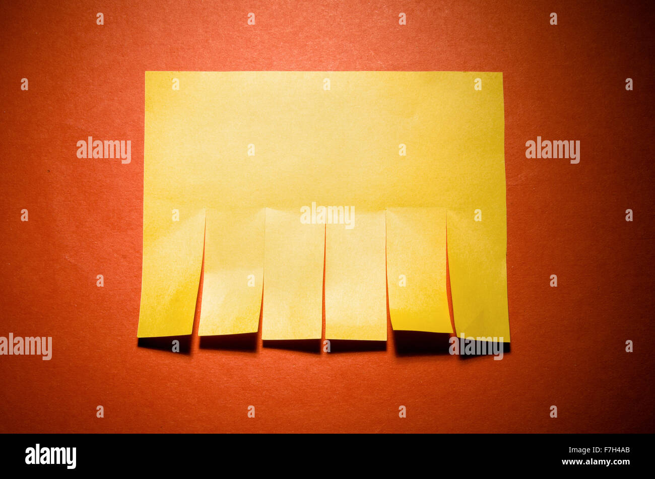 Tear off paper notice on the wall Stock Photo - Alamy