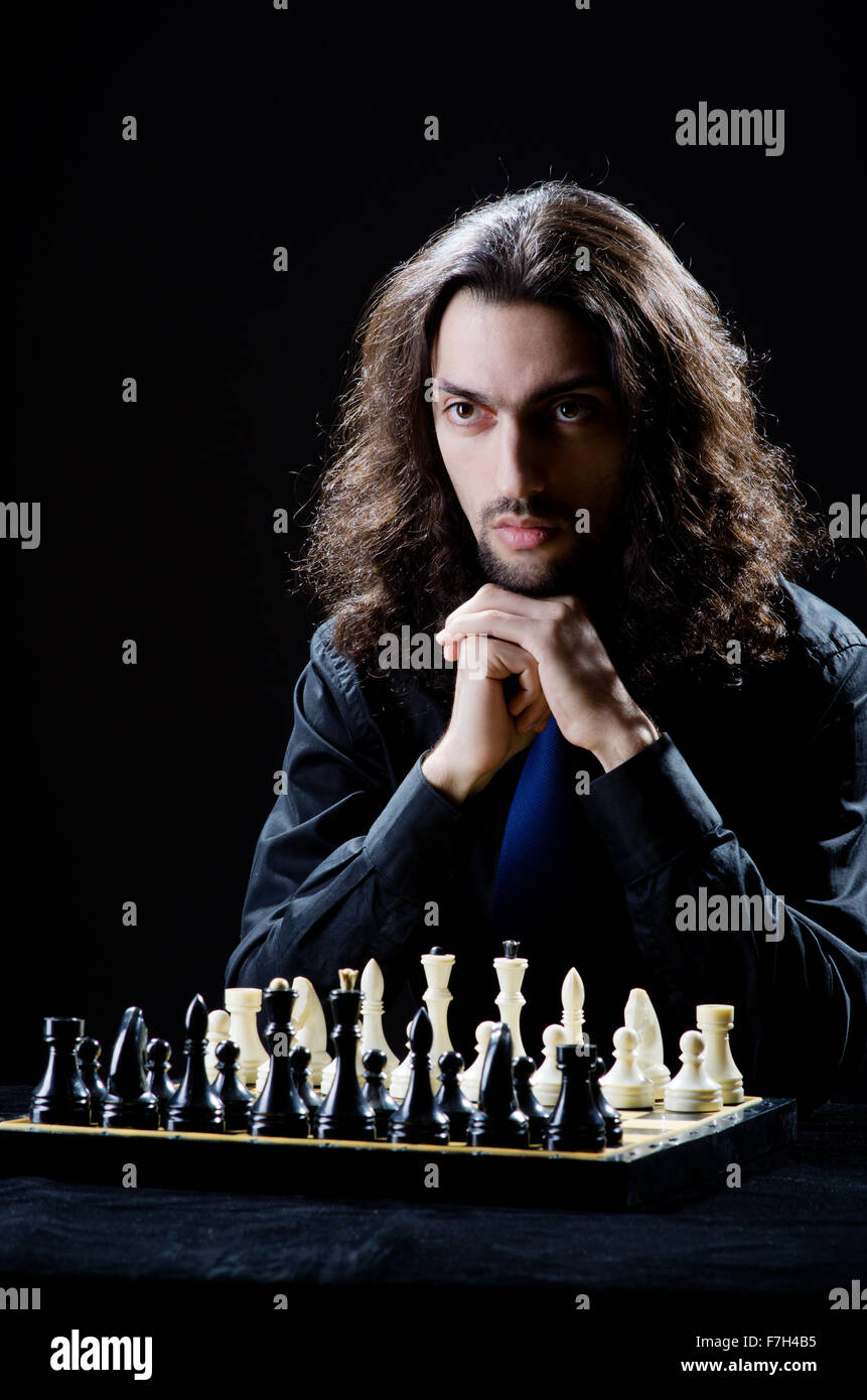 Chess player playing his game Stock Photo - Alamy