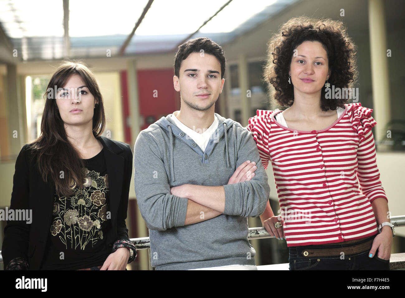 happy students people group portrait at university indoor building ...