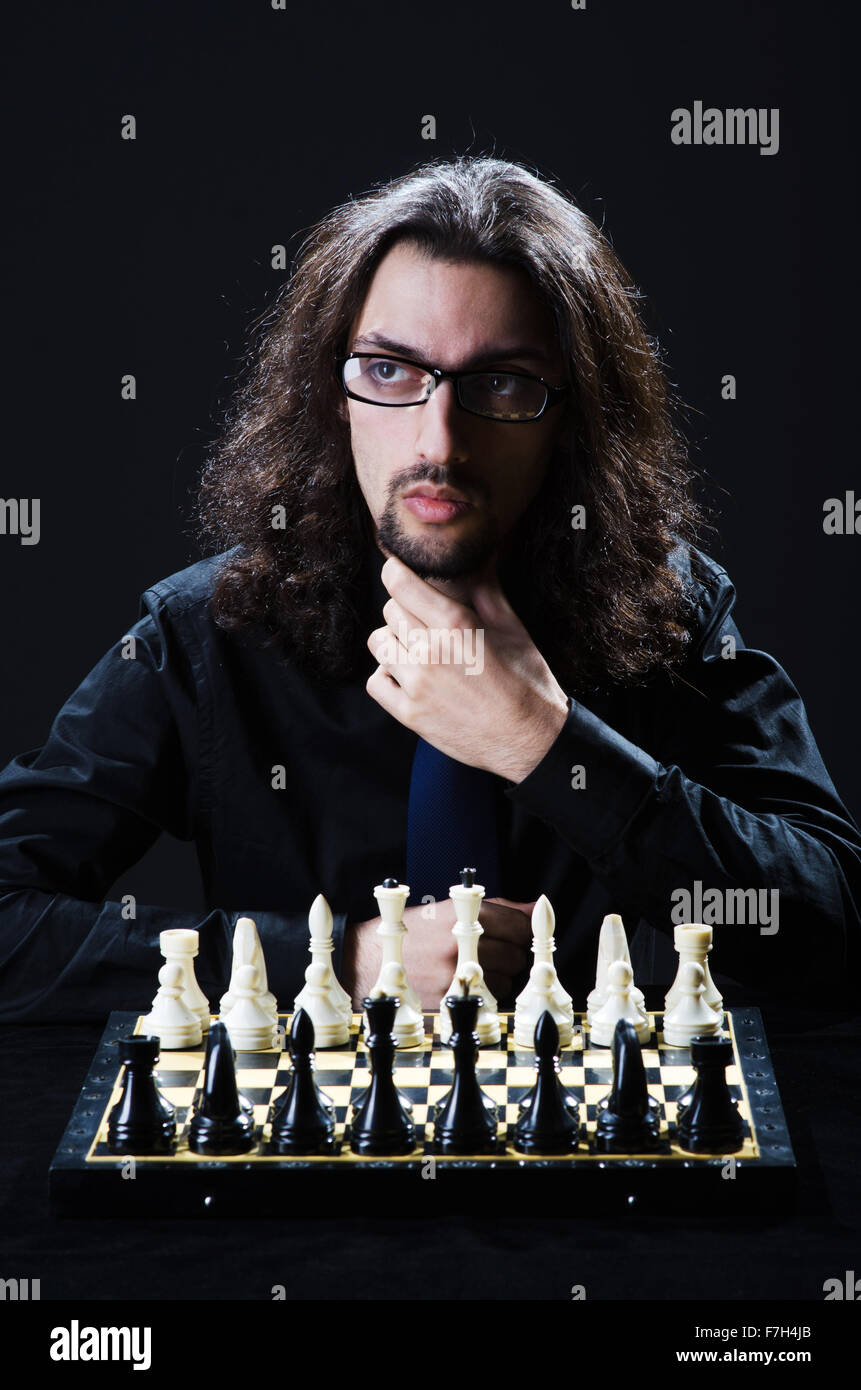Chess player playing his game Stock Photo - Alamy