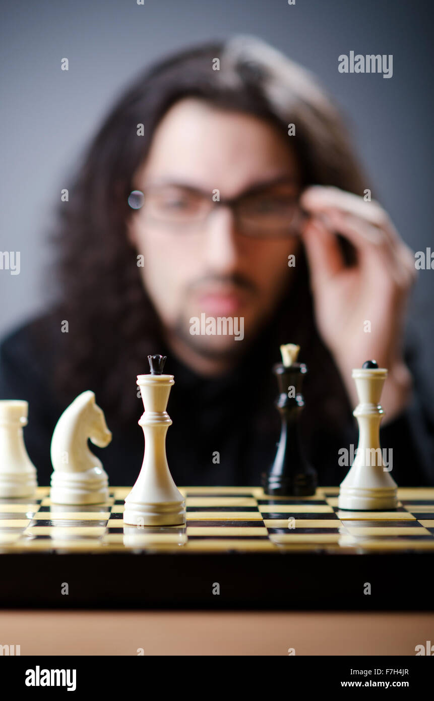 Chess player playing his game Stock Photo - Alamy