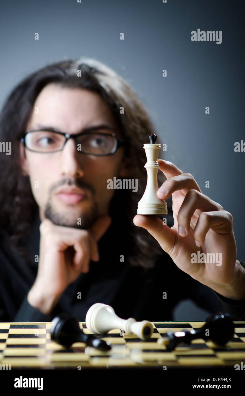 Chess player playing his game Stock Photo - Alamy