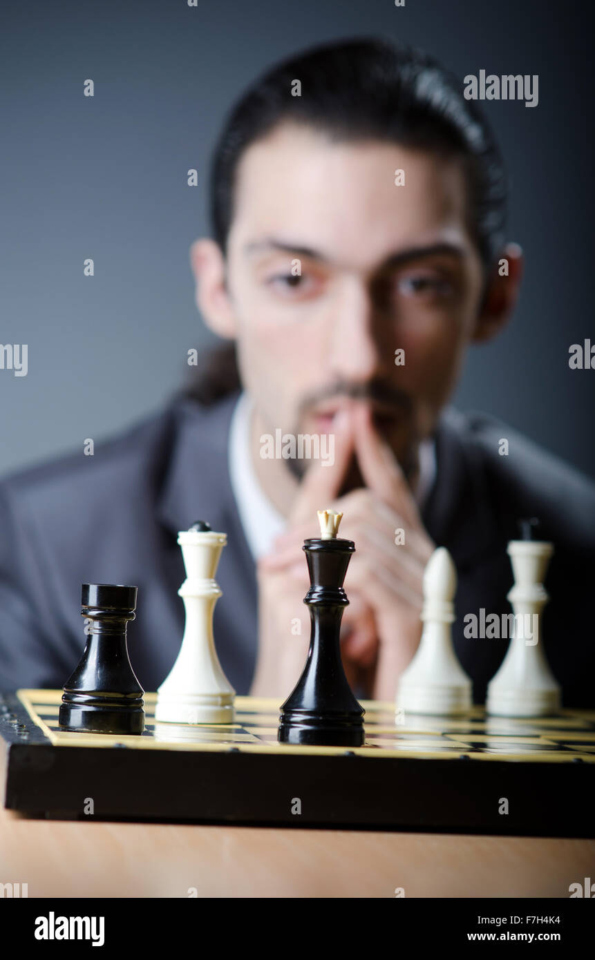 Chess player playing his game Stock Photo - Alamy