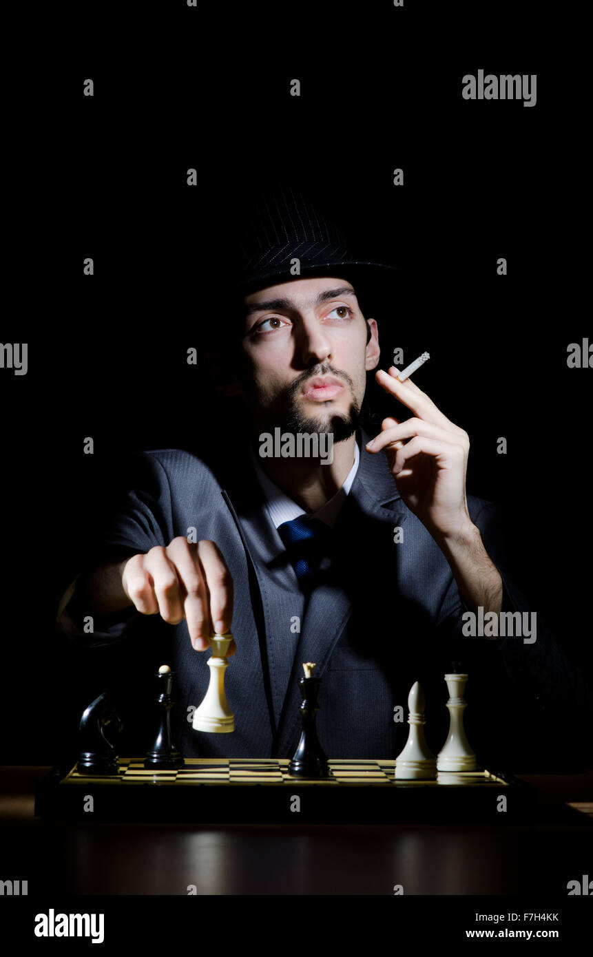 Chess player playing his game Stock Photo - Alamy