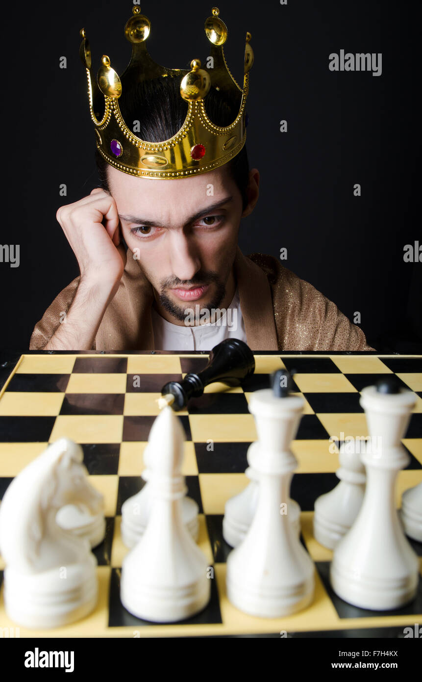 Chess player playing his game Stock Photo - Alamy