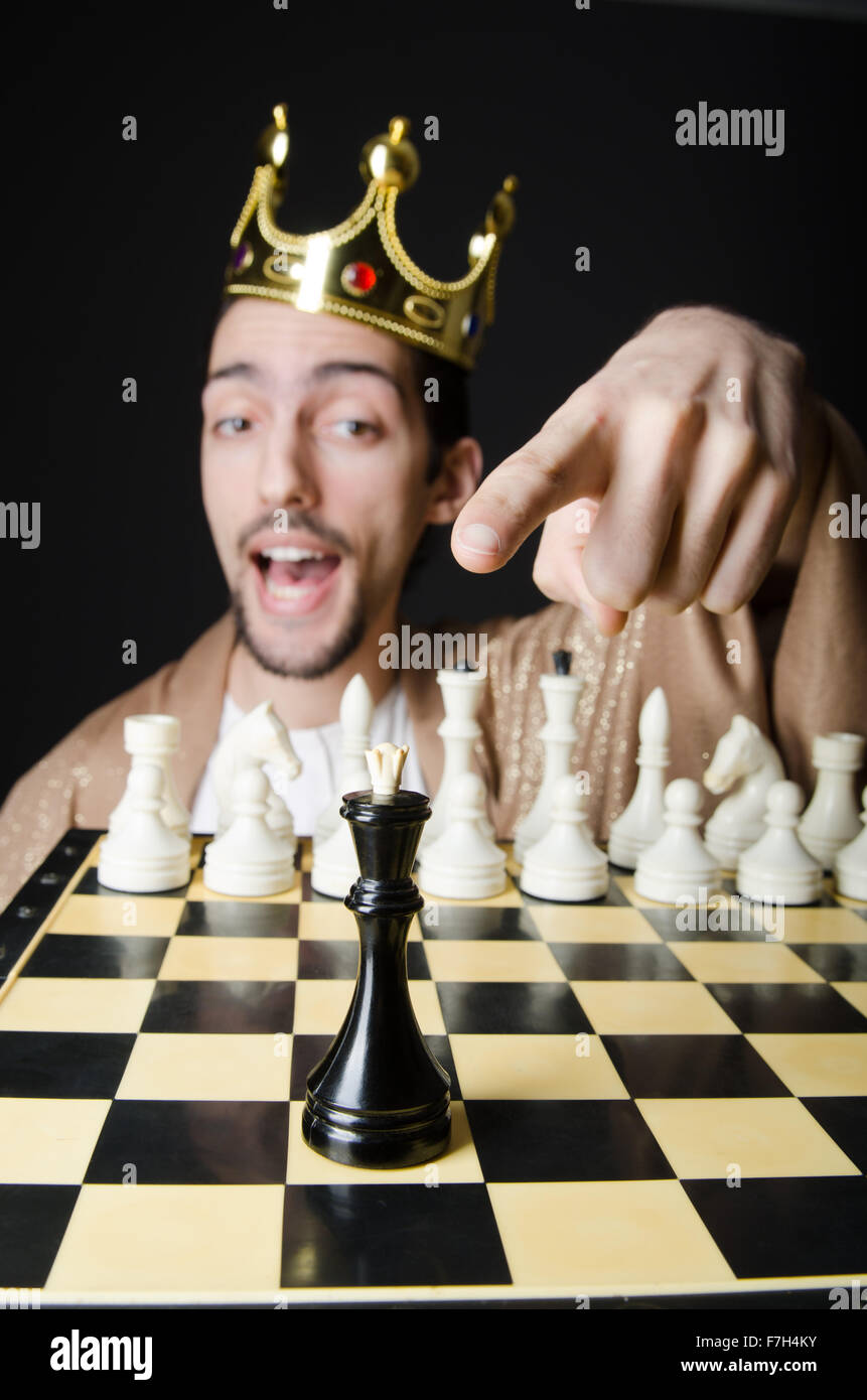 Chess player playing his game Stock Photo - Alamy