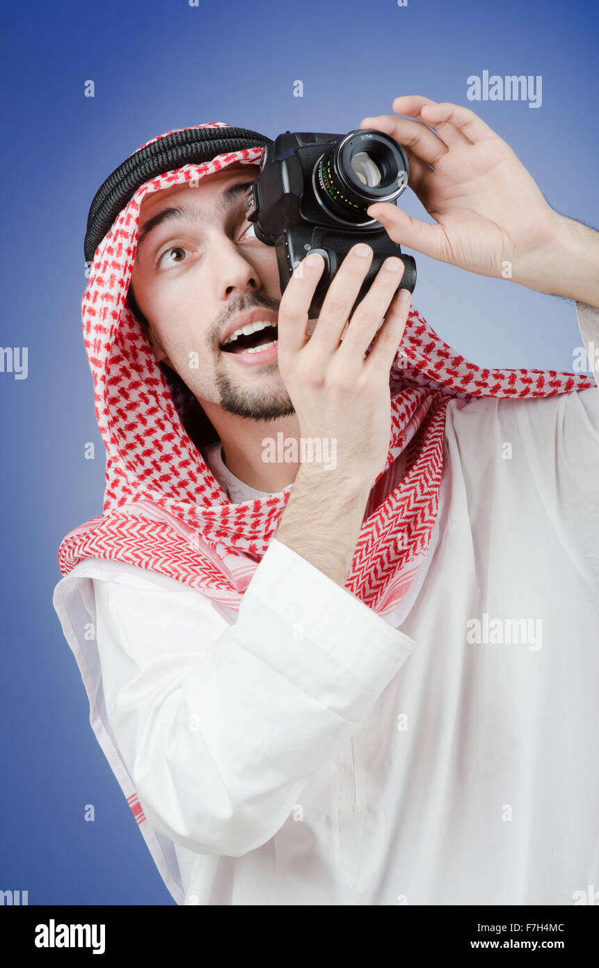 Arab photographer in studio shooting Stock Photo - Alamy