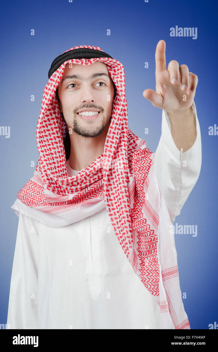 Arab pushing virtual buttons Stock Photo - Alamy