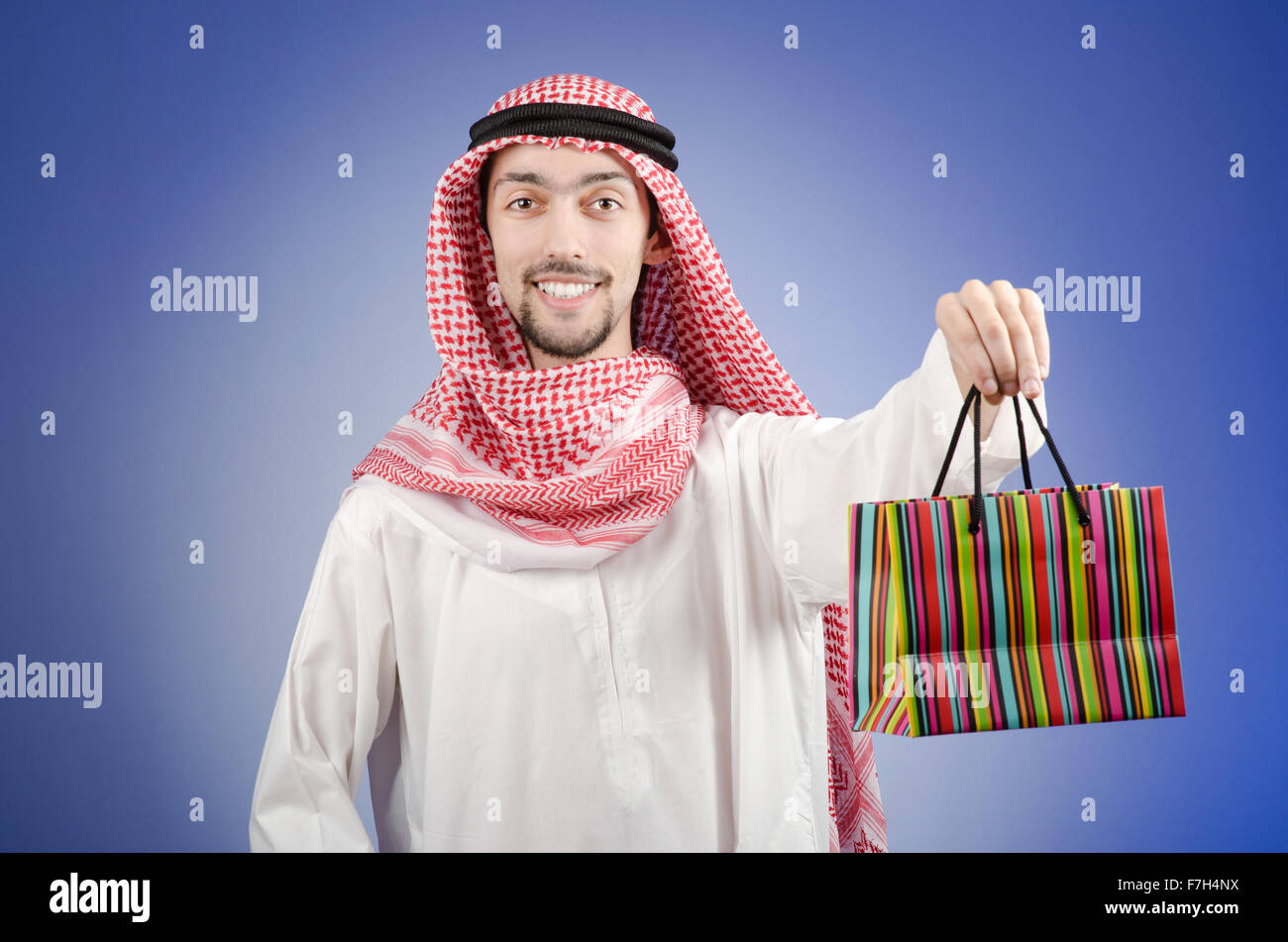Arab with the gift bags Stock Photo - Alamy