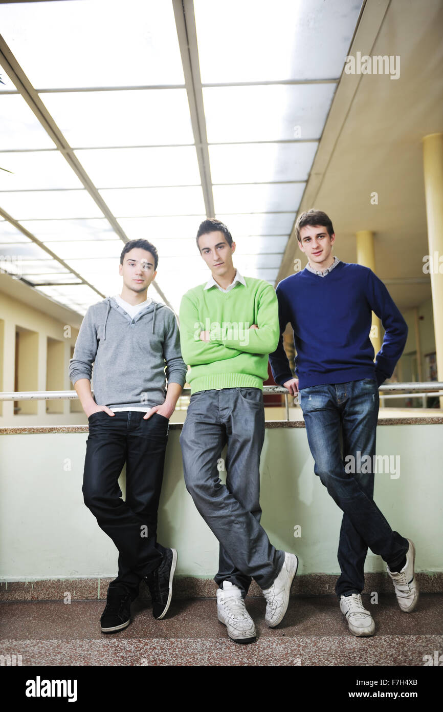 happy students people group portrait at university indoor building ...