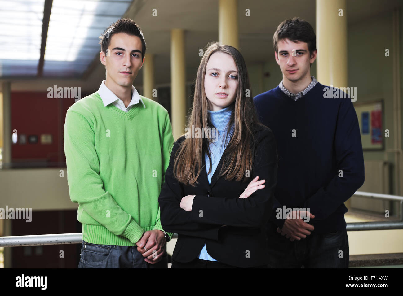 happy students people group portrait at university indoor building ...