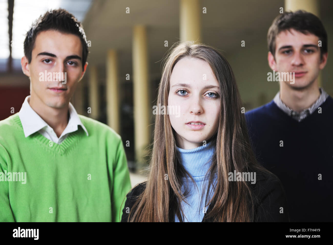 happy students people group portrait at university indoor building ...