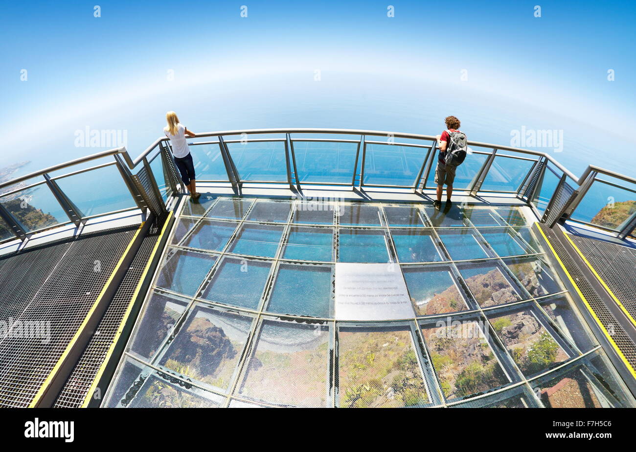 Madeira - tourists on the glass floor terrace at the top of Cabo Stock ...