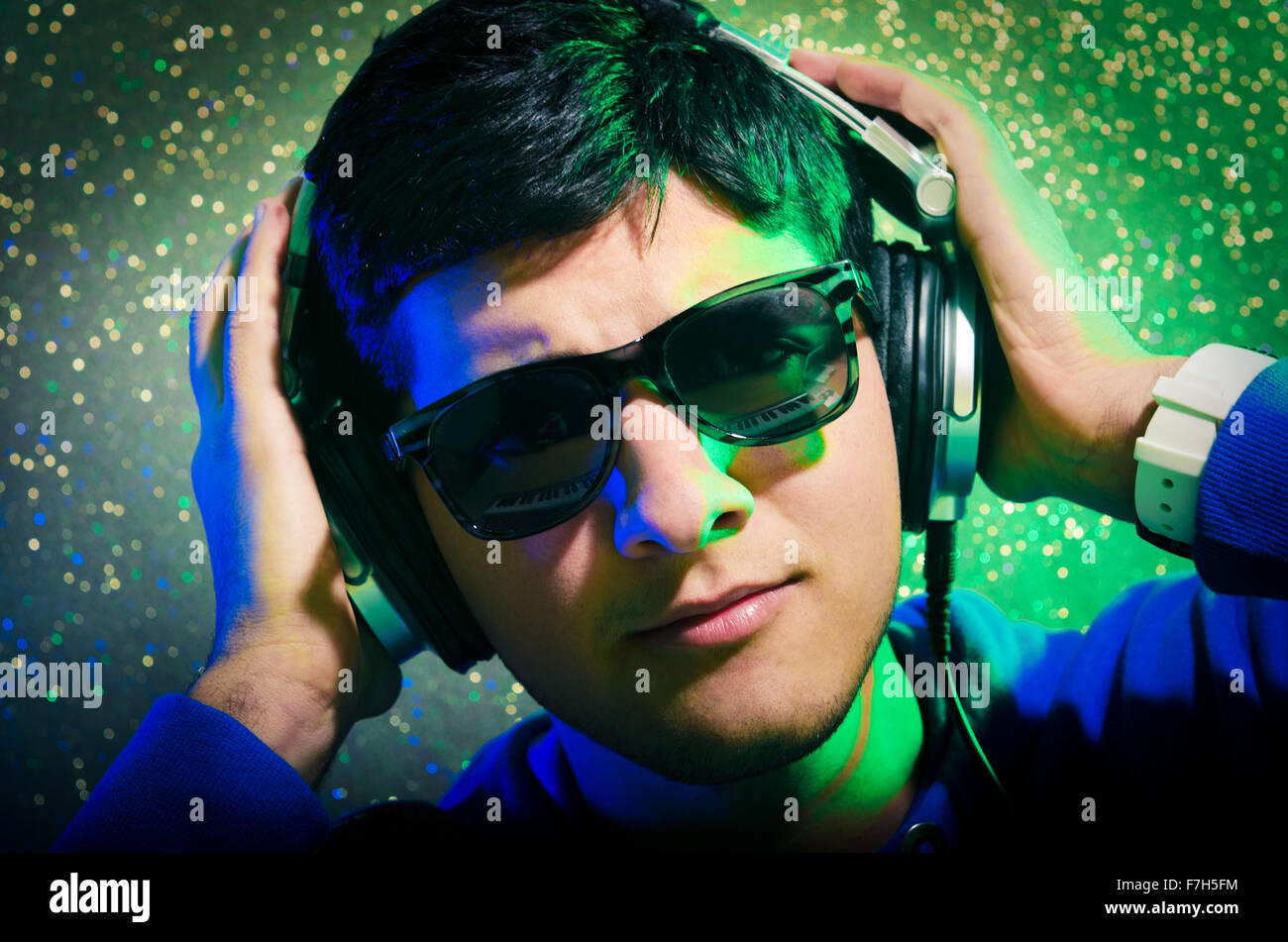 DJ mixing music at disco Stock Photo - Alamy