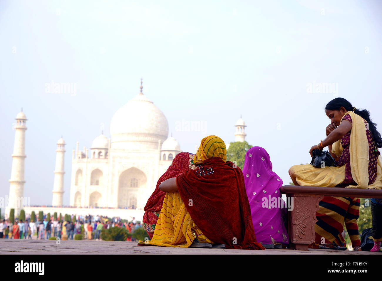 Women wearing colorful dress and enjoying beautiful Taj-Architecture ...