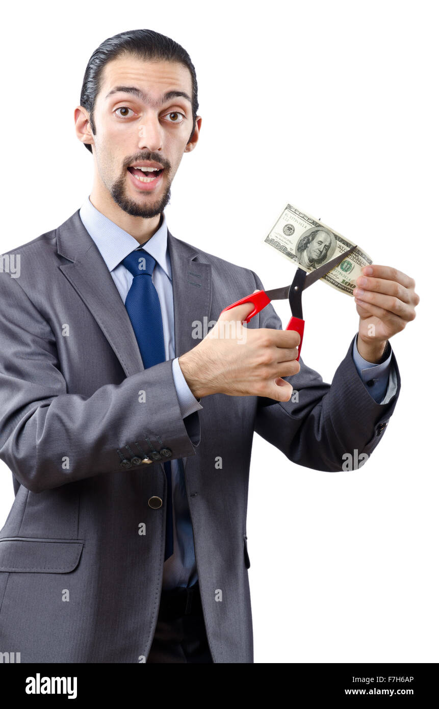 Man cutting money on white Stock Photo - Alamy