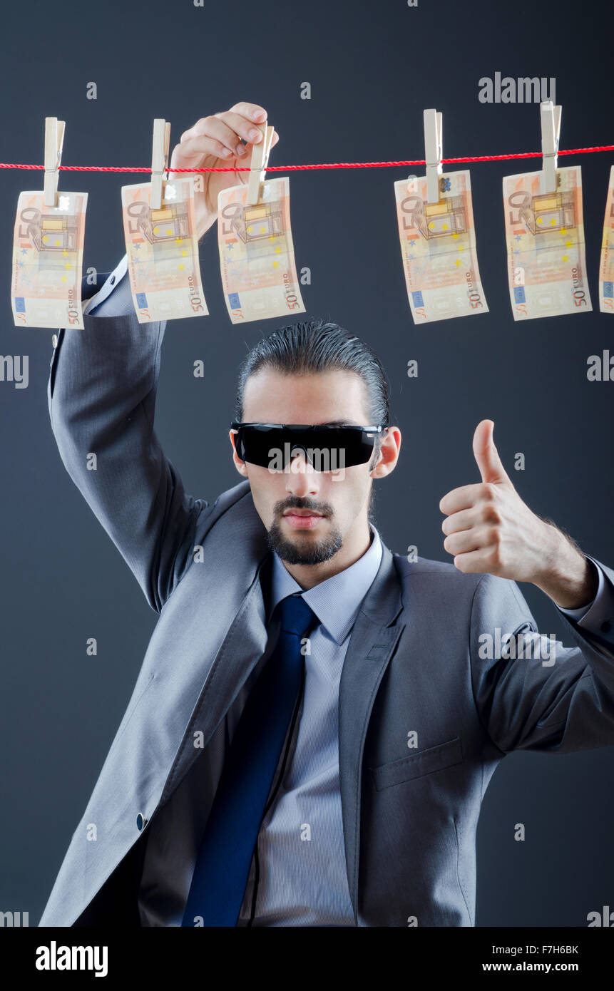 Criminal laundering dirty money Stock Photo - Alamy
