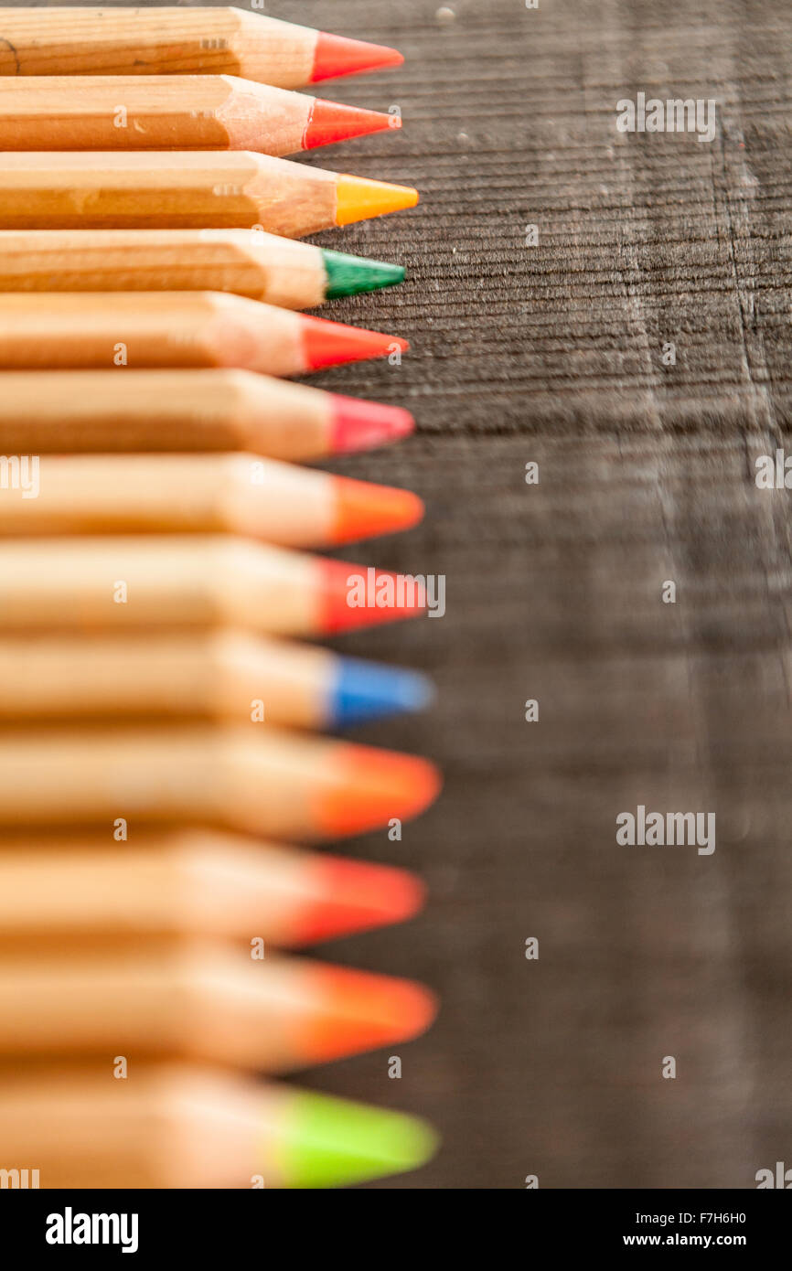 Group of crayons and they are on wooden background, the picture is ...