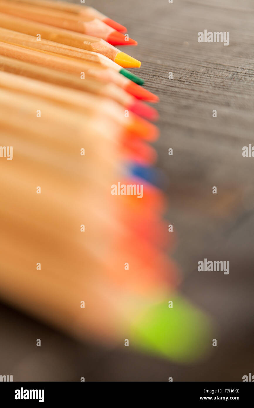 Group of crayons and they are on wooden background, the picture is ...