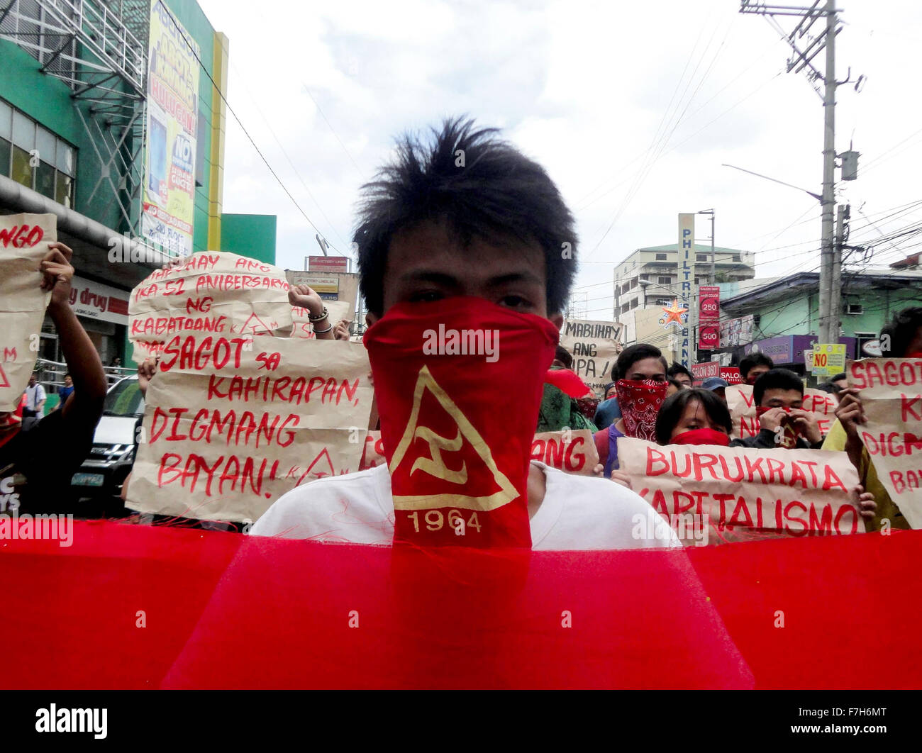 Filipino activists from the communist youth group Kabataang Makabayan ...