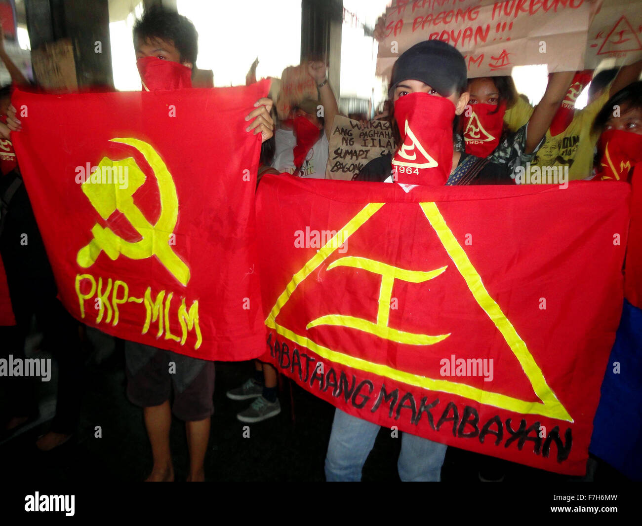 Filipino activists from the communist youth group Kabataang Makabayan ...