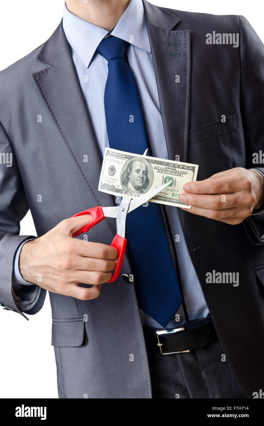 Man cutting money on white Stock Photo - Alamy