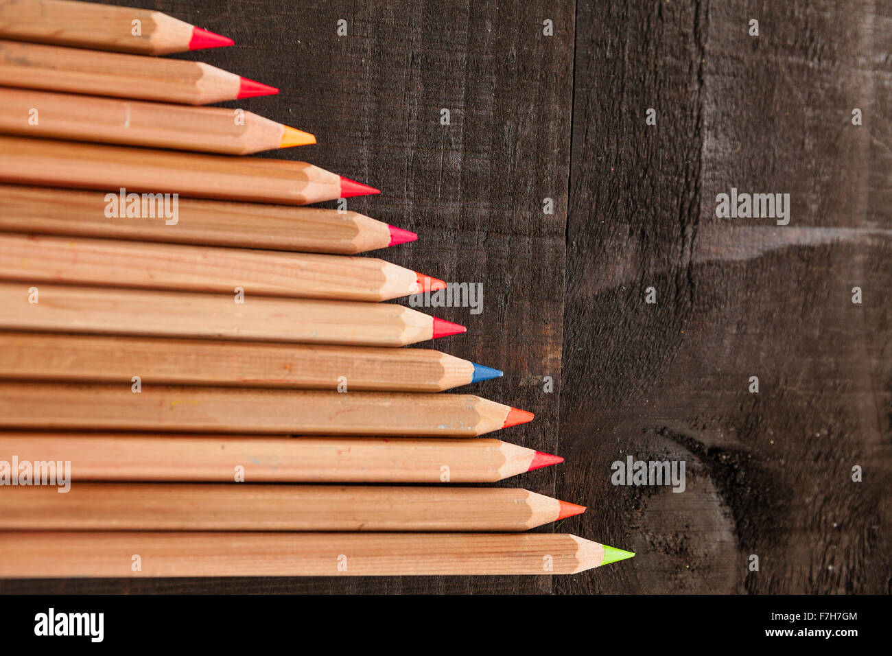 Group of crayons and they are on wooden background, the picture is ...