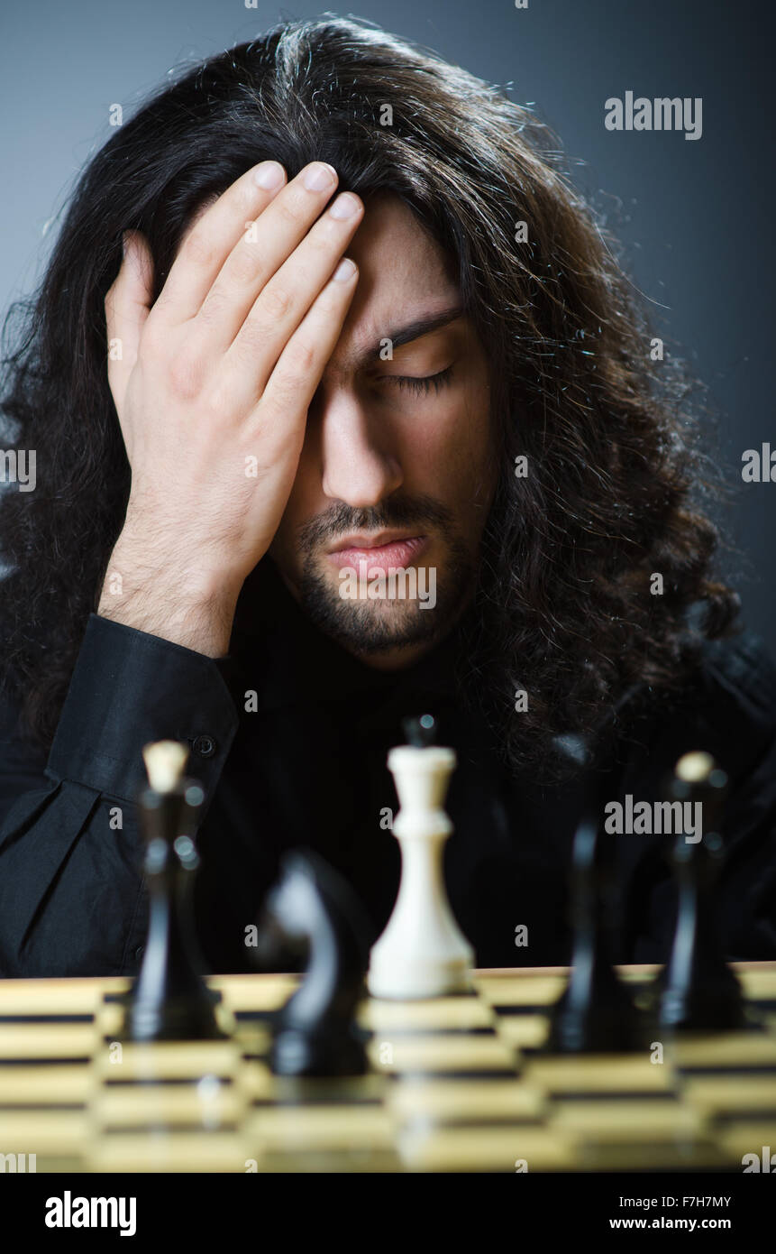 Chess player playing his game Stock Photo - Alamy